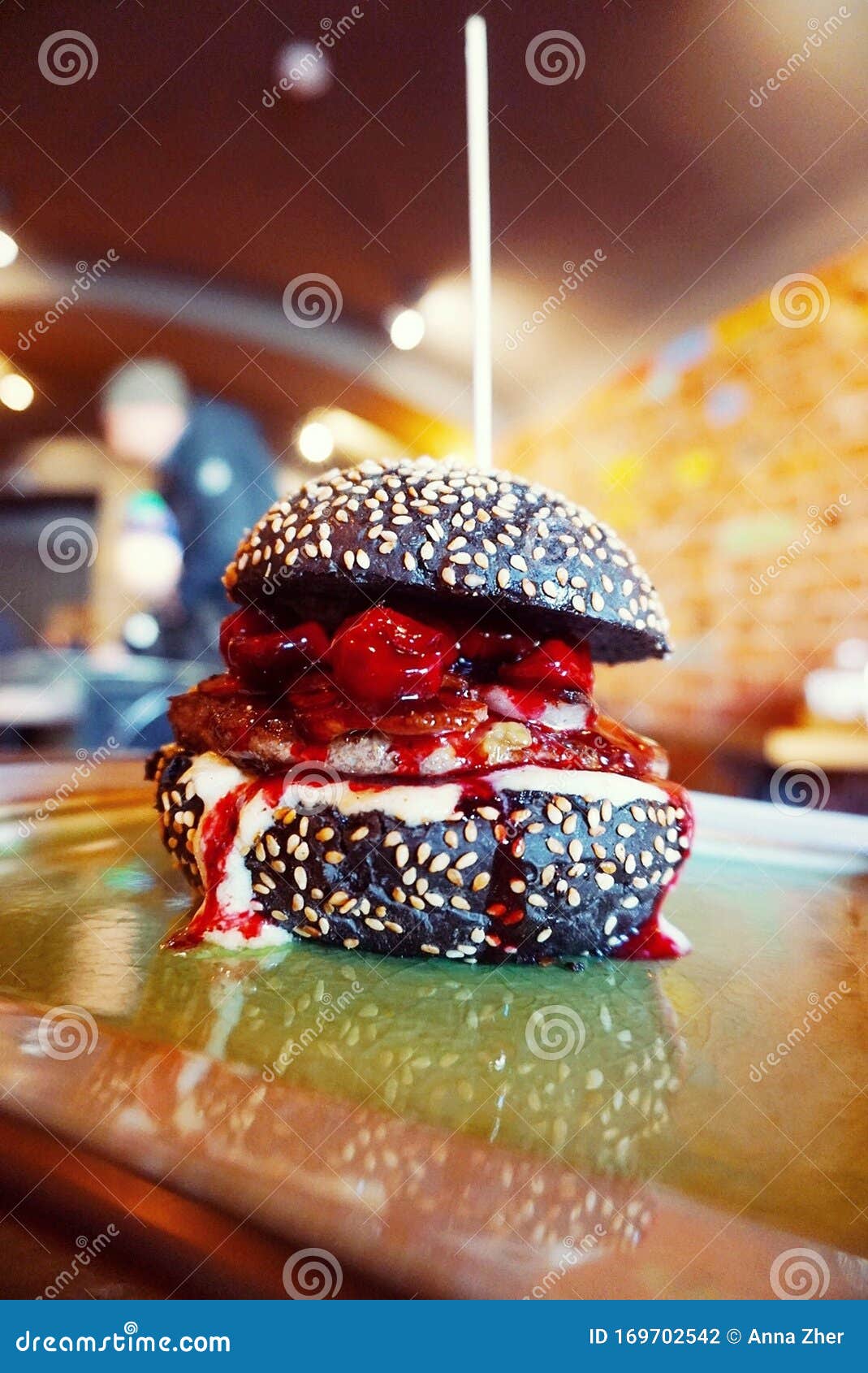 Burger with cherry jam stock photo. Image of tasty, cherry - 169702542