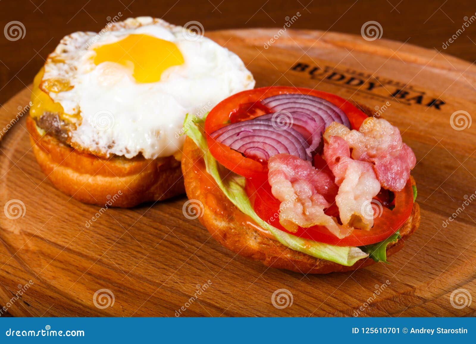 Burger with egg and ham stock image. Image of restaurant - 125610701