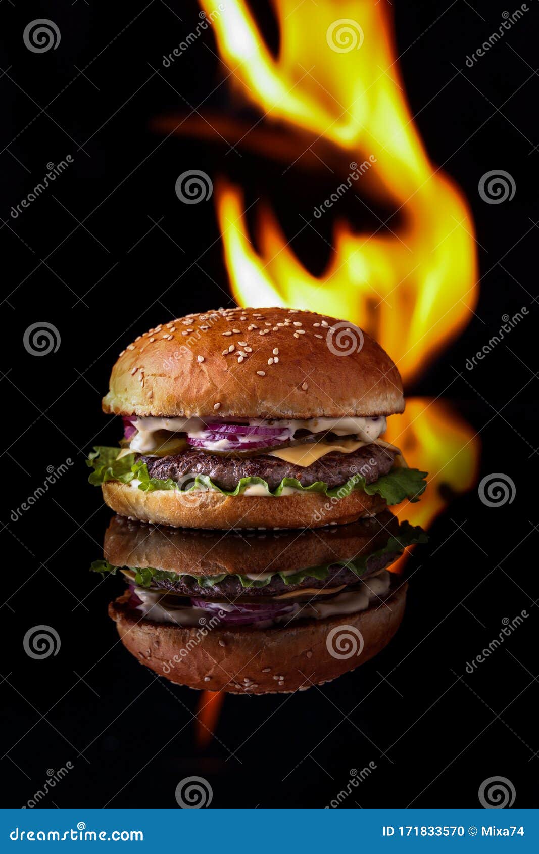 Burger with Fire on a Black Background for the Site3 Stock Photo ...
