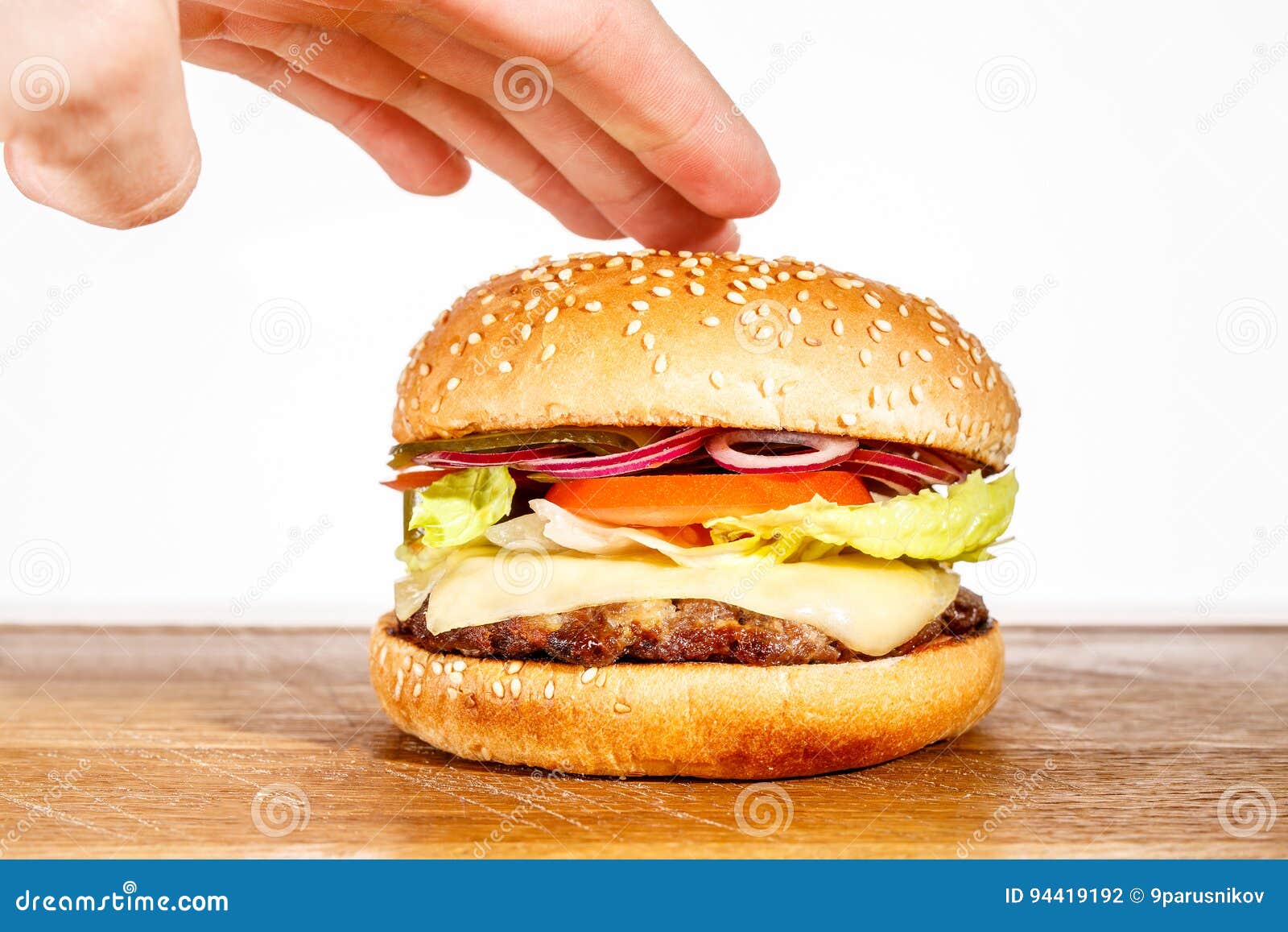 The Burger in the Hand of the Chef Stock Photo - Image of gourmet, cook ...