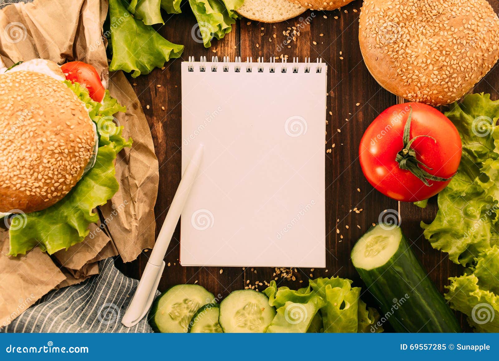 Burger with Ingredients and Notepad on Table Stock Image - Image of ...