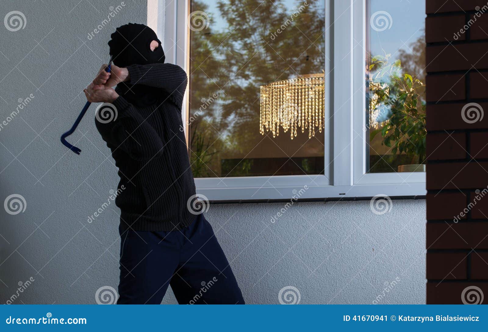 Burglar Tries To Smash a Window Stock Image - Image of steal, alarm ...
