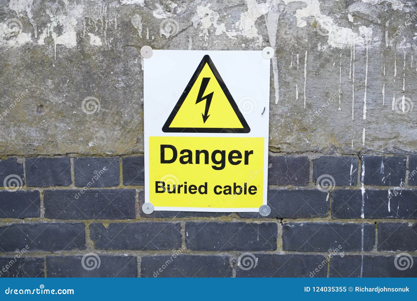 Buried Electrical Cable Danger on Wall Stock Image - Image of civil ...