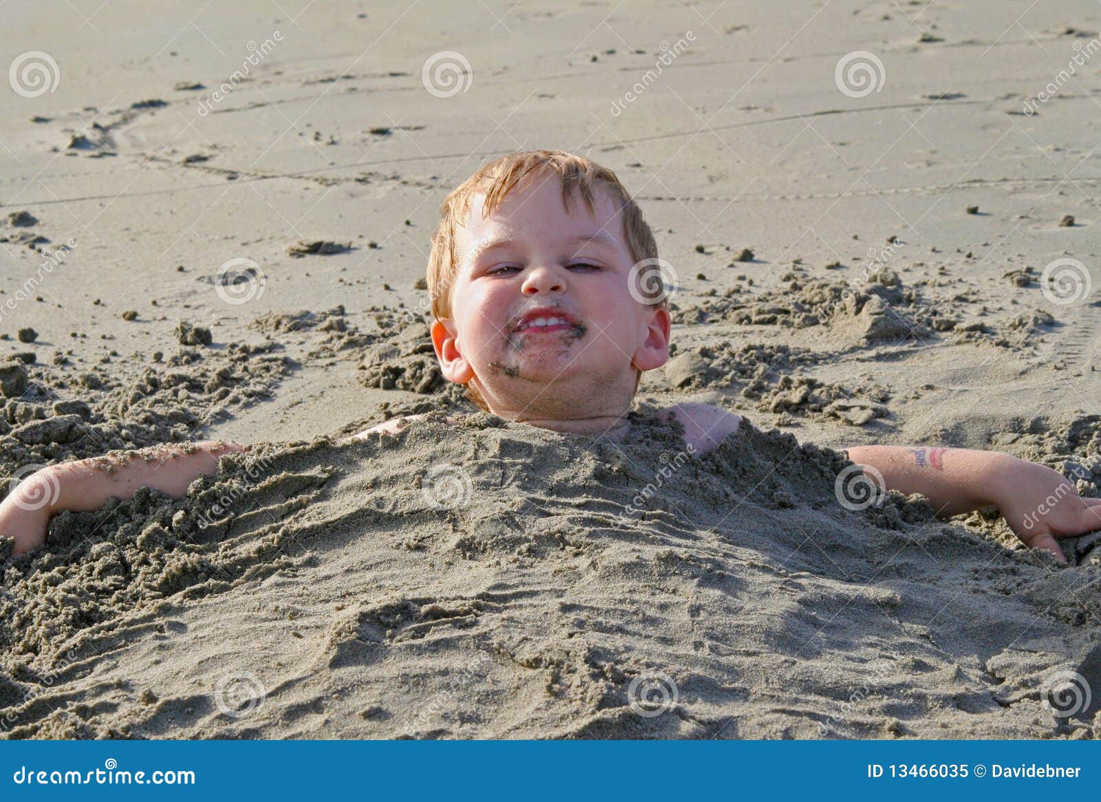 Buried in sand stock image. Image of closeup, underground - 13466035