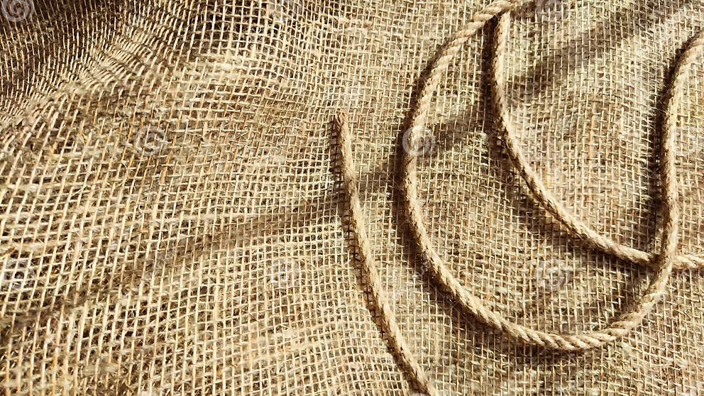 Burlap Fabric, Coarse Jute Weave, and Thick Burlap Rope. Background ...