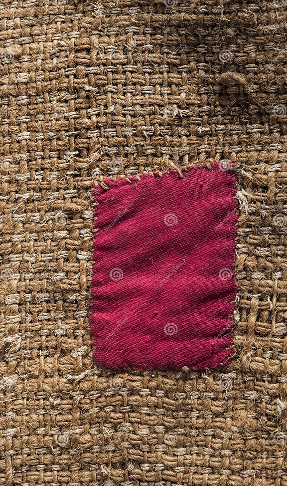 Burlap with red patch stock image. Image of textured - 84889907
