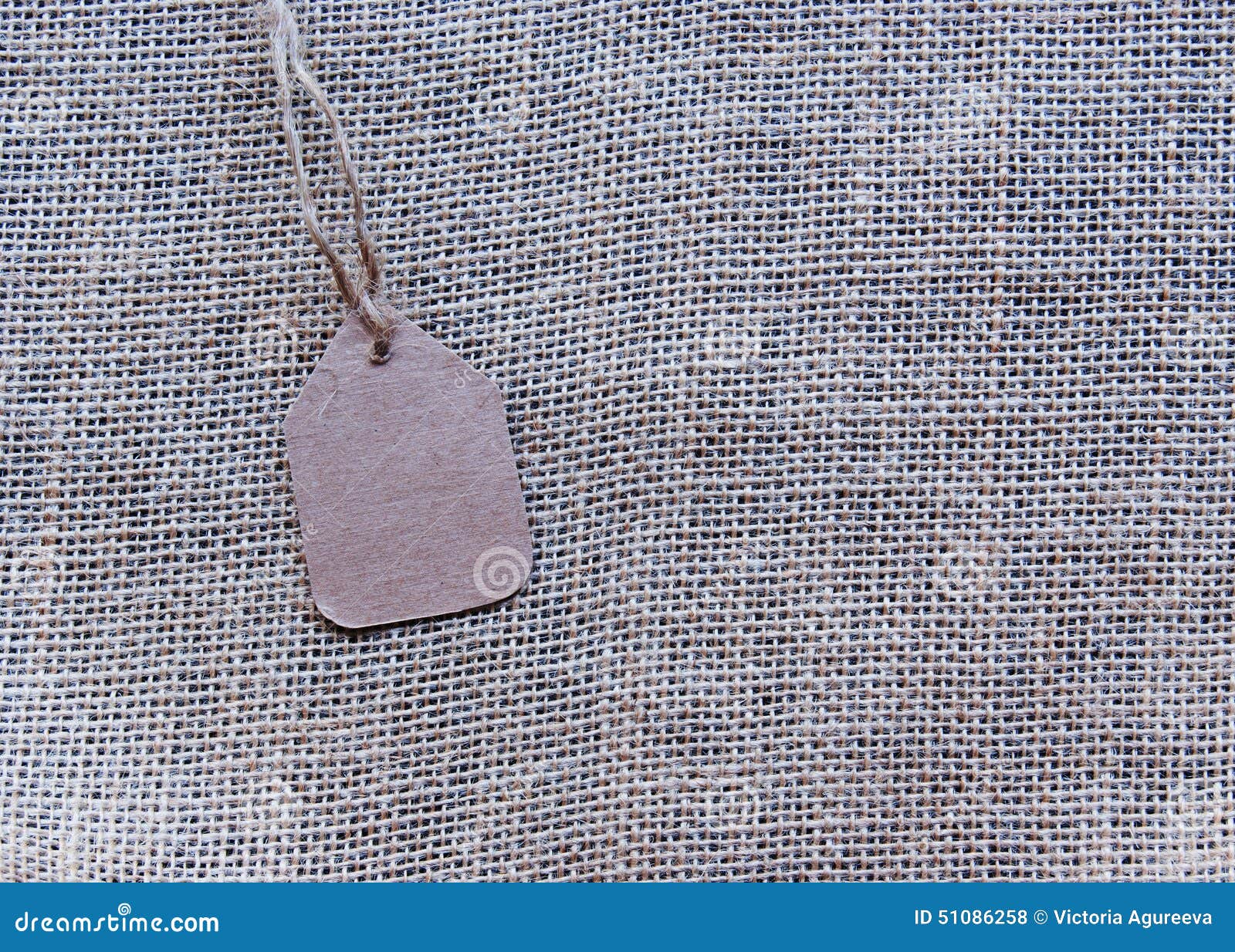 Burlap Textured Surface with a Price Tag Stock Photo - Image of ...