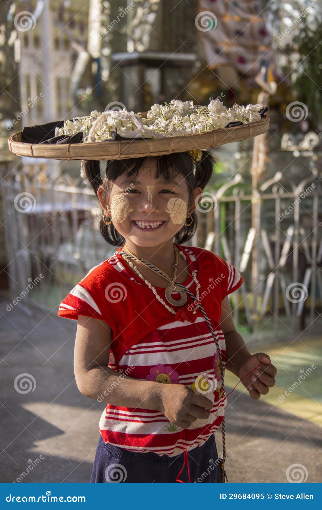 MANDALAY, MYANMAR - DECEMBER 18. 2015: Cute Burmese Girl Choosing ...
