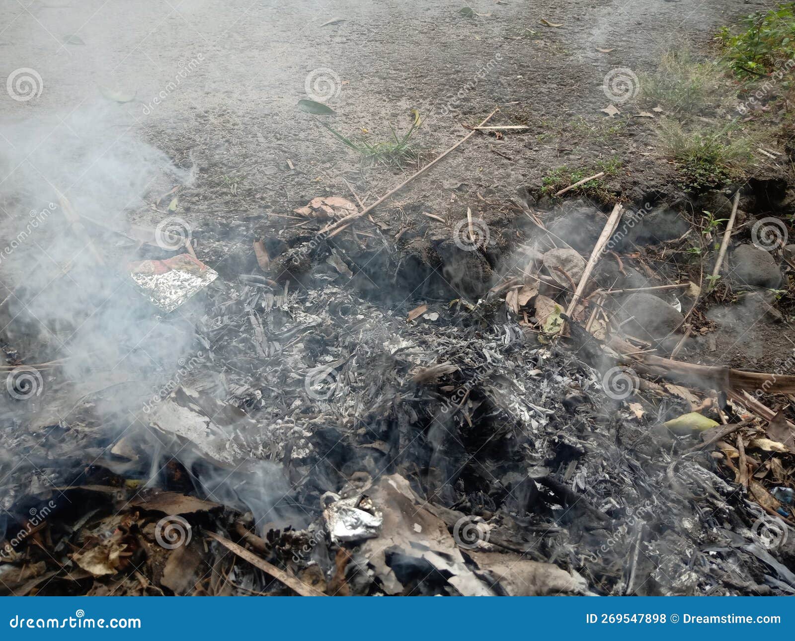 Burn Trash on the Side of the Road Stock Photo - Image of rock, river ...
