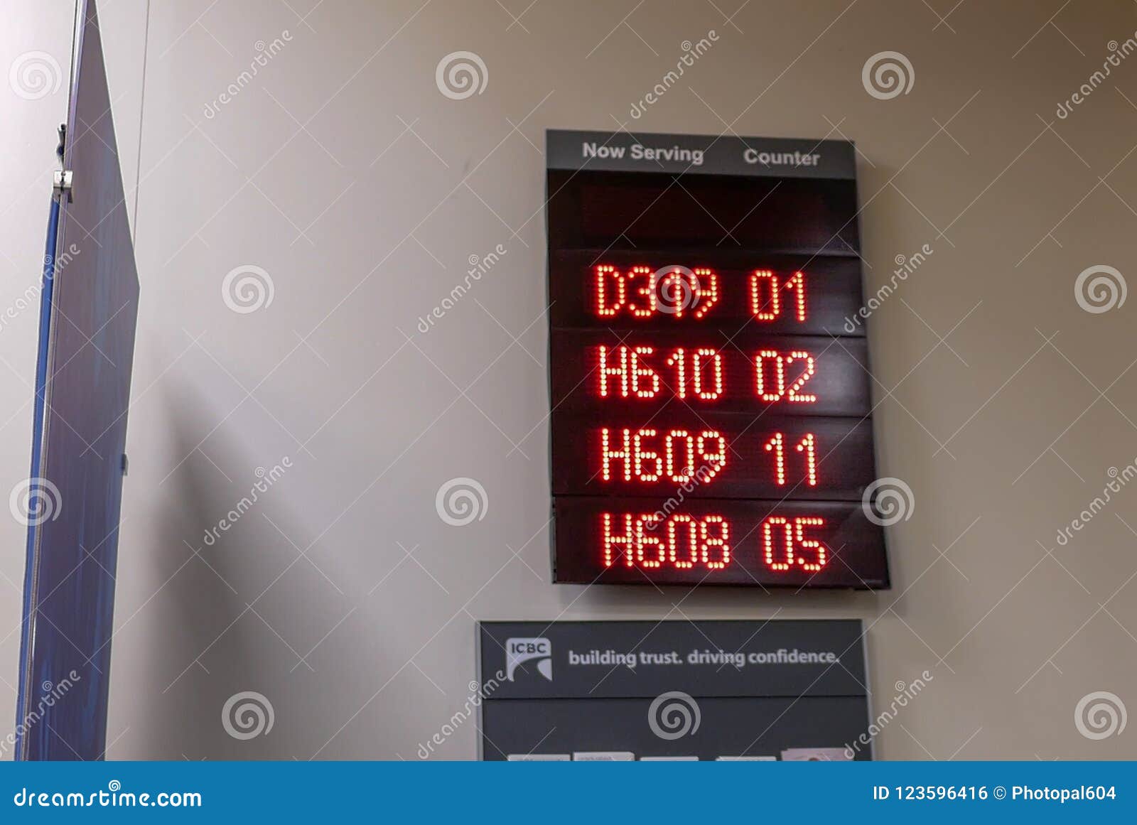 Close Up of Serving Number Board on Wall beside Reception Site Inside ...