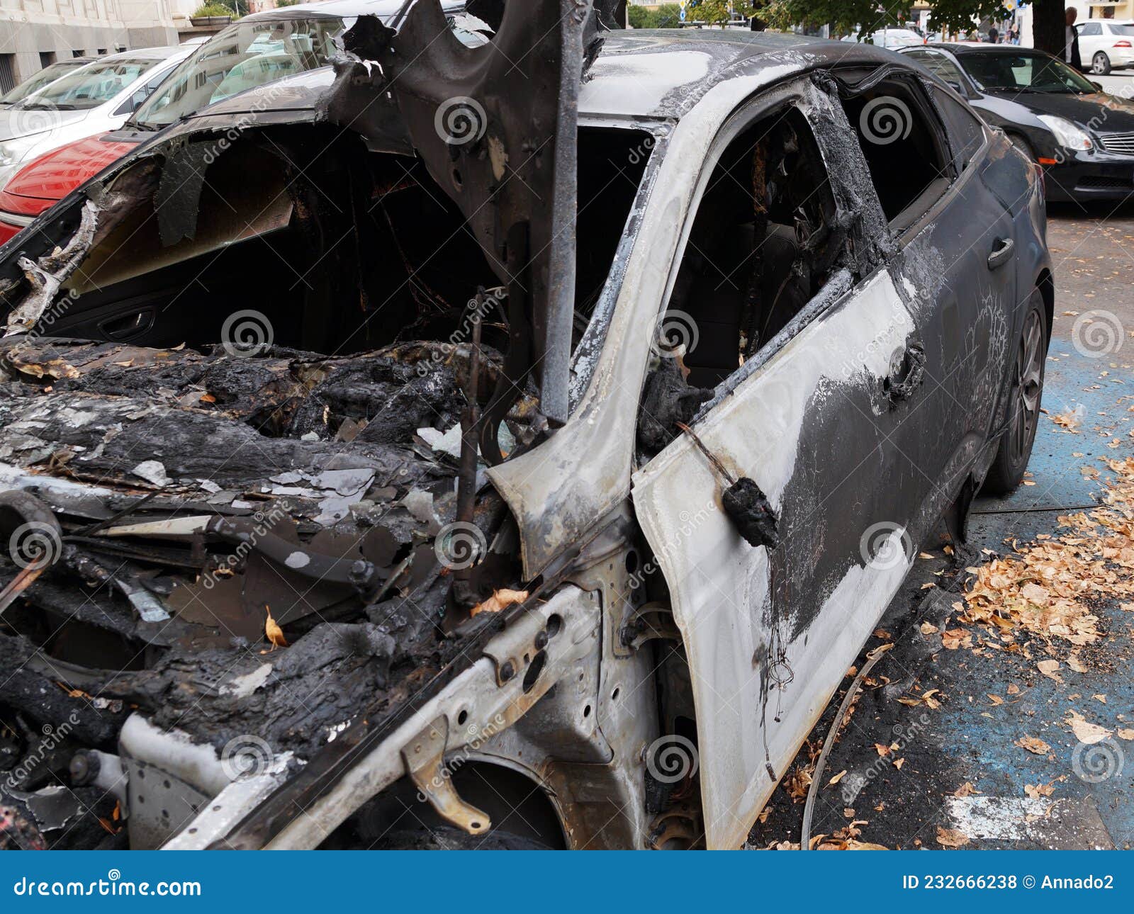 Burned Black Car with Open Deformed Hood Stock Photo - Image of ...