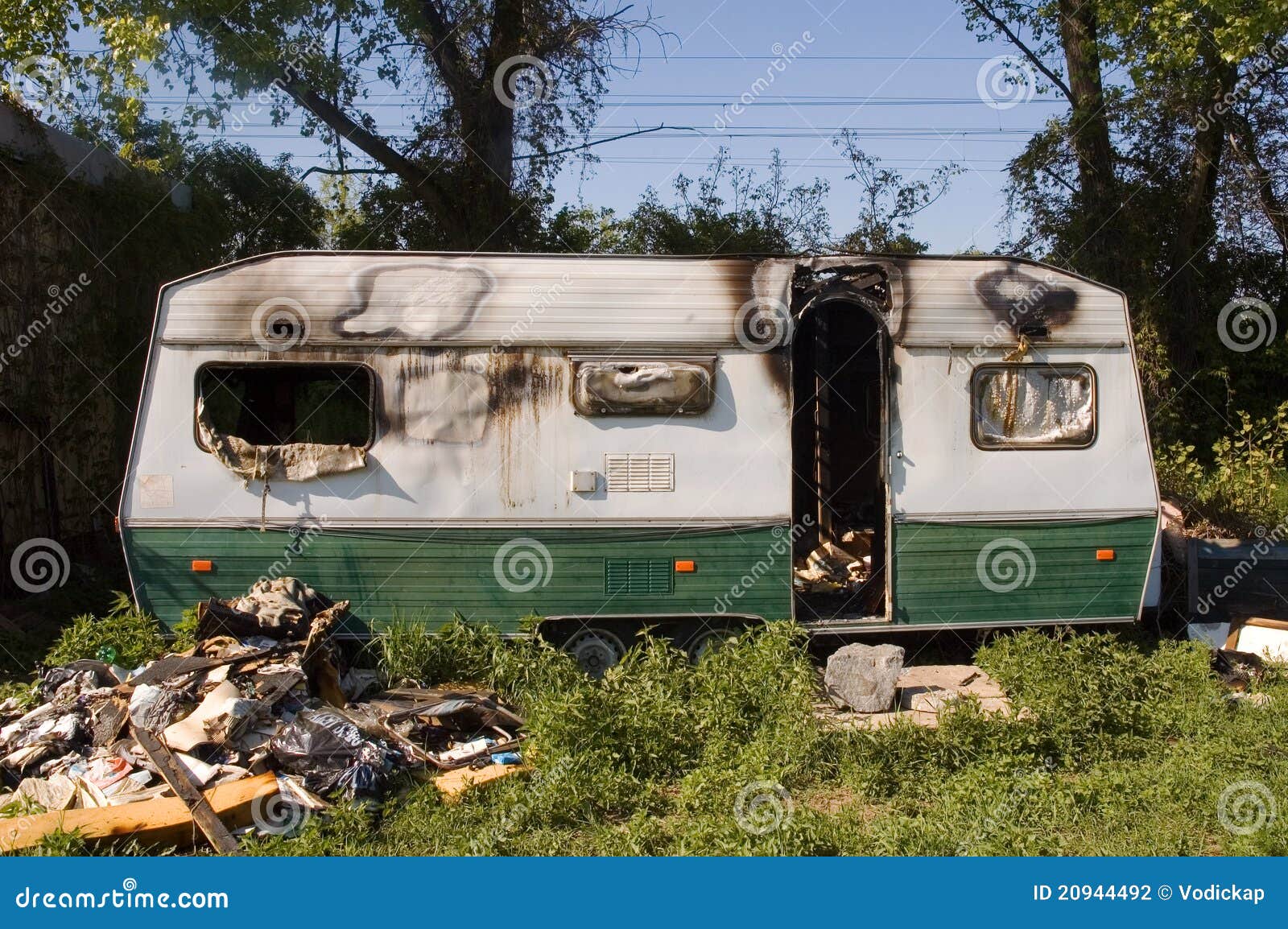 Burned caravan stock photo. Image of green, burned, trees - 20944492