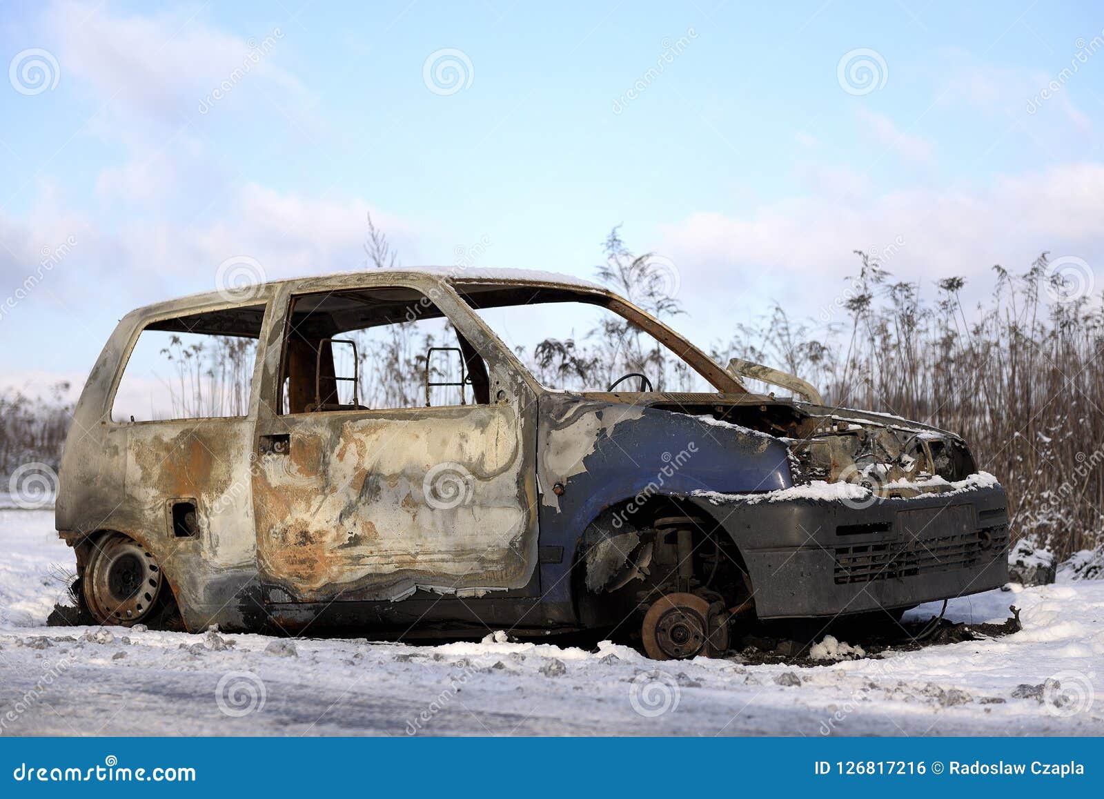 Burned, Destroyed Car Standing on the Side of the Road in the Winter ...