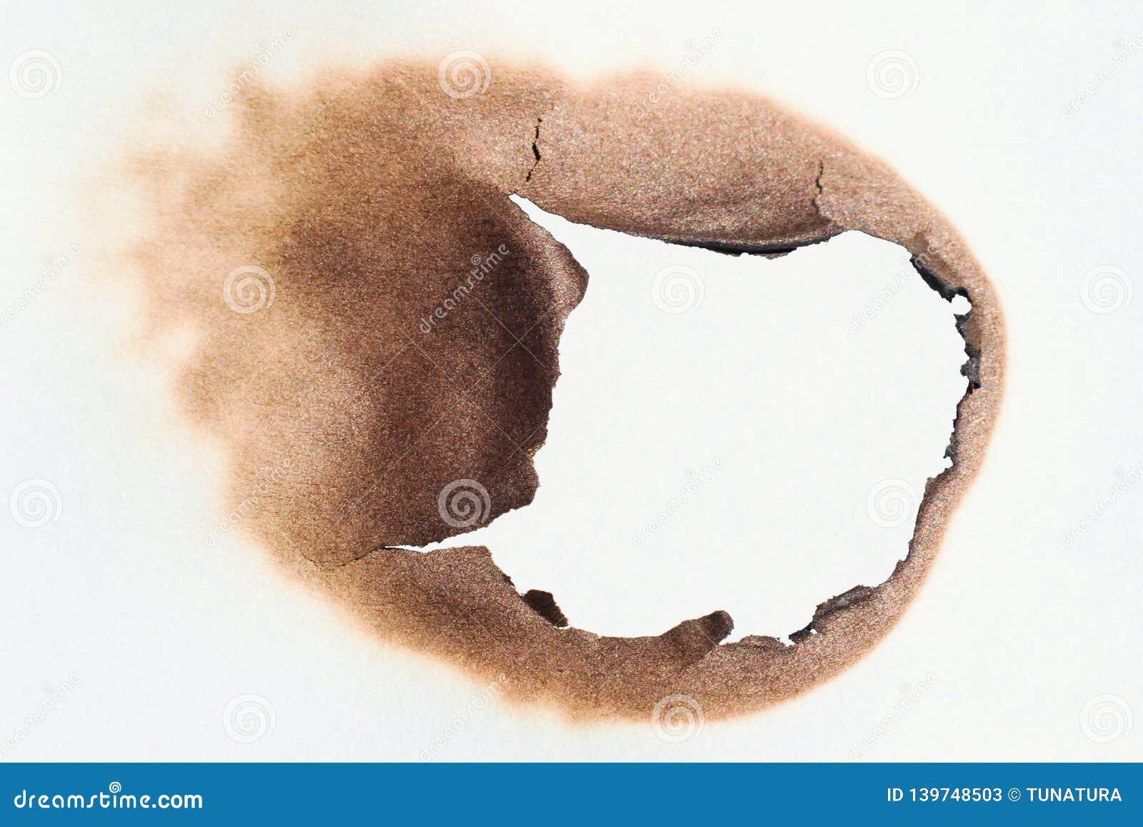 Burned hole in the paper stock image. Image of circle - 139748503