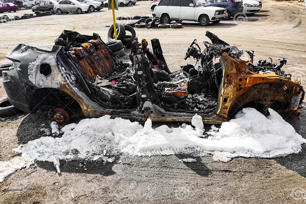 Burned-out Car after Arson Accident. Melted Plastic in a Fire. Stock ...