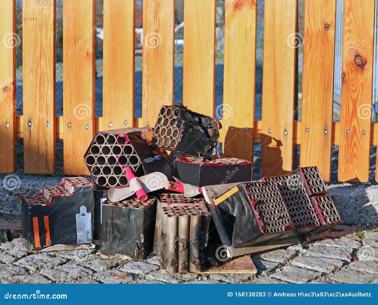Burned Out Firework Batteries after Silvester in Front of Garden Fence ...