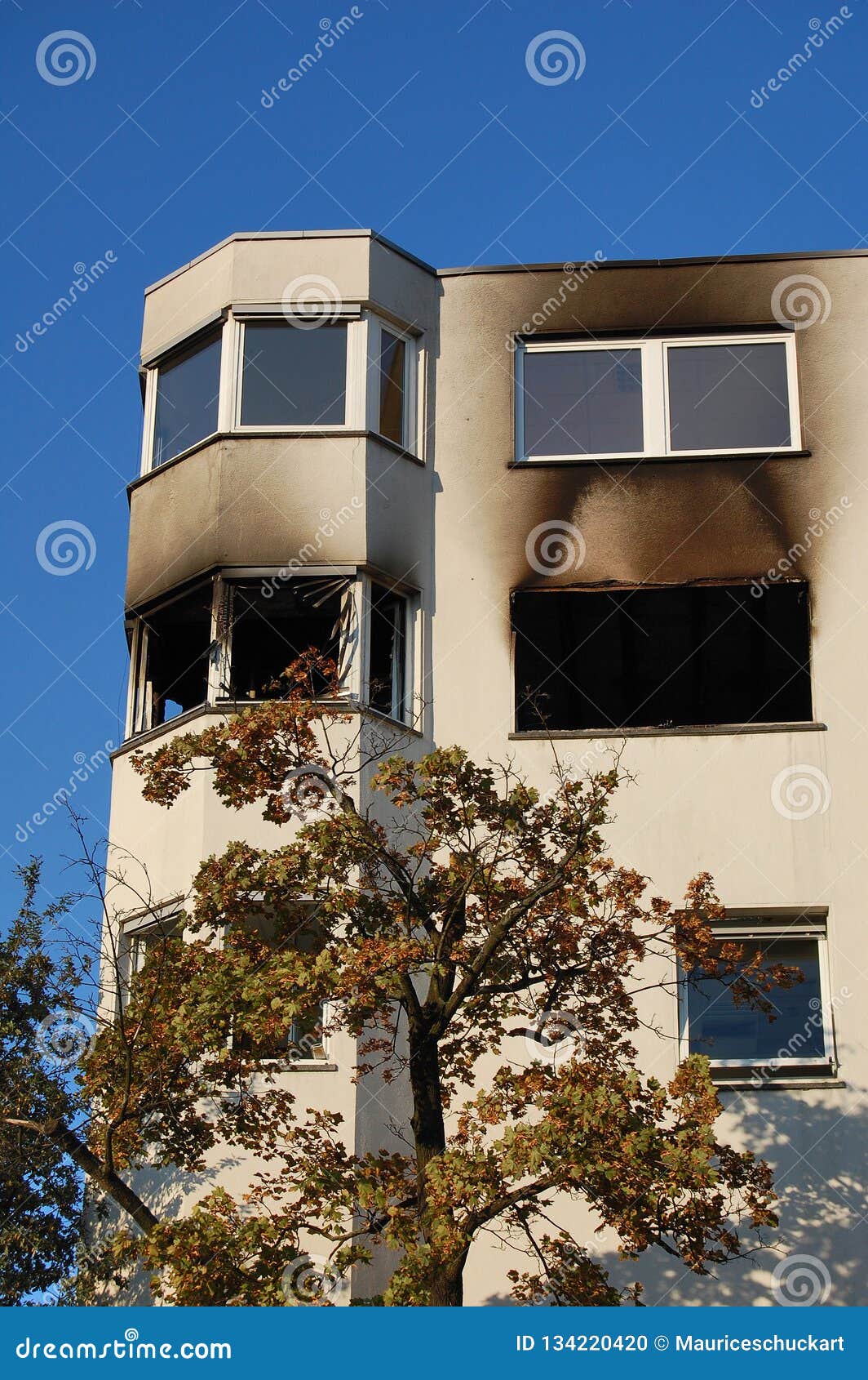 Burned out house in a town stock photo. Image of destruction - 134220420