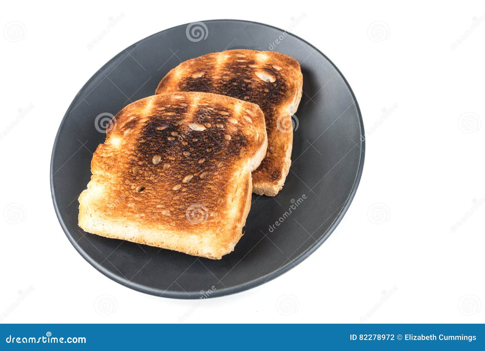 Burned whole grain toast stock photo. Image of unbuttered - 82278972