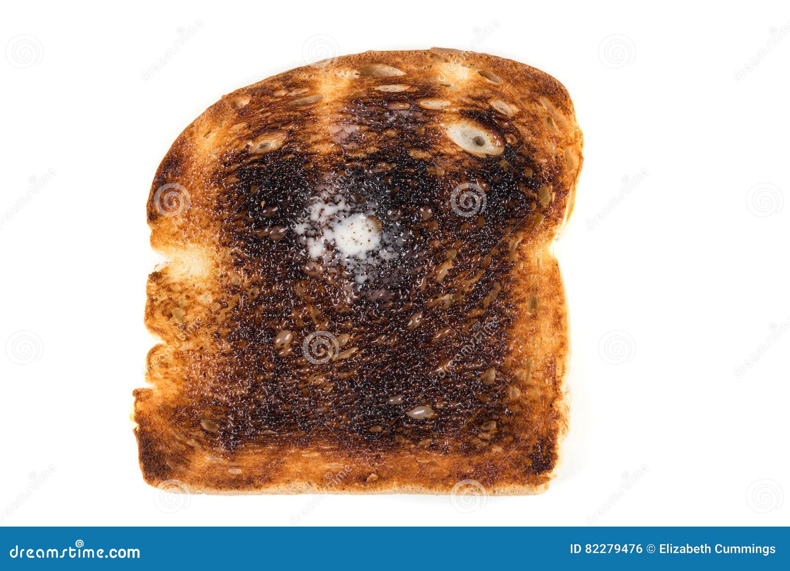 Burned whole grain toast stock photo. Image of buttered - 82279476