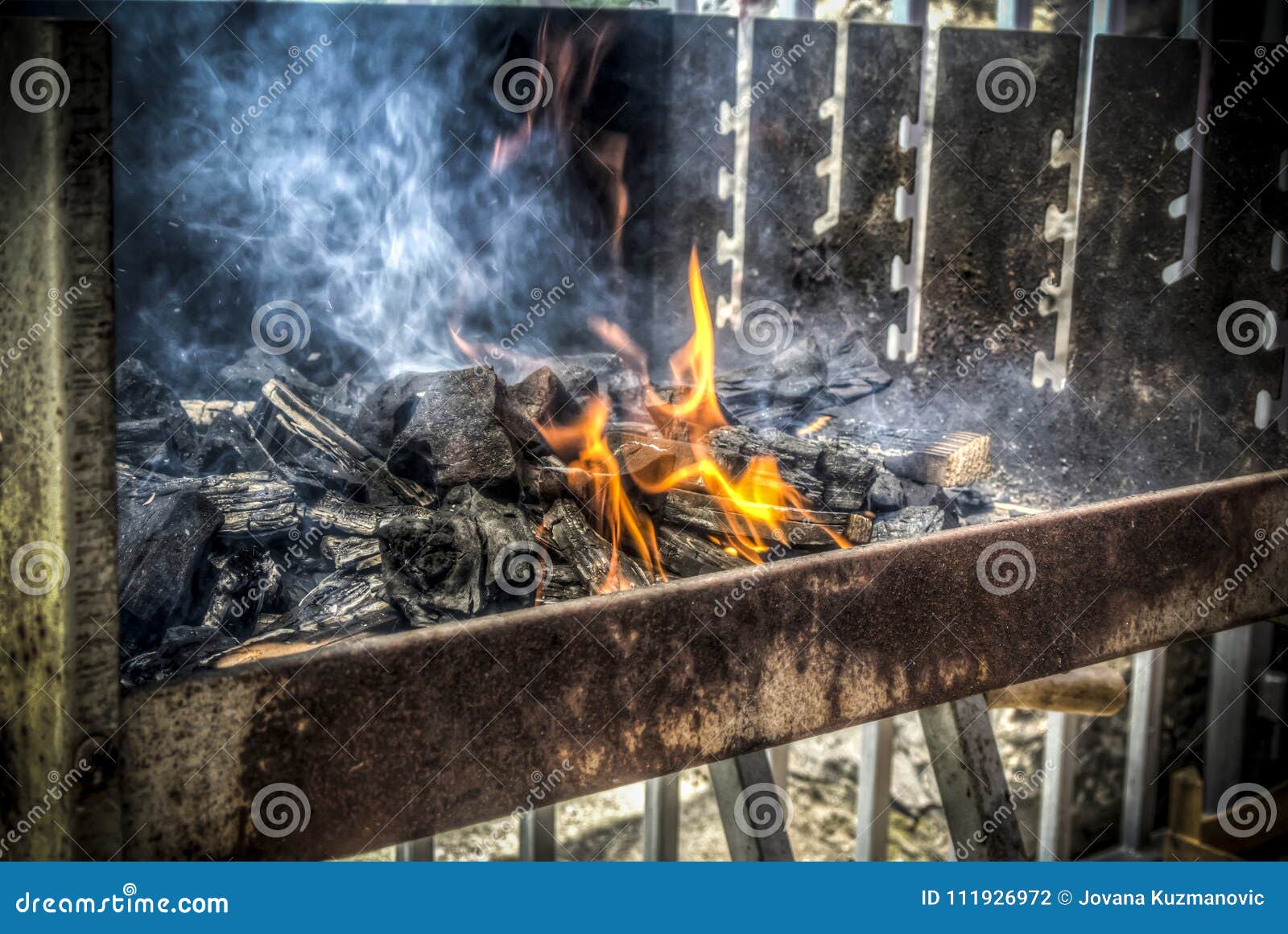 A Burning Barbecue stock photo. Image of light, bright - 111926972