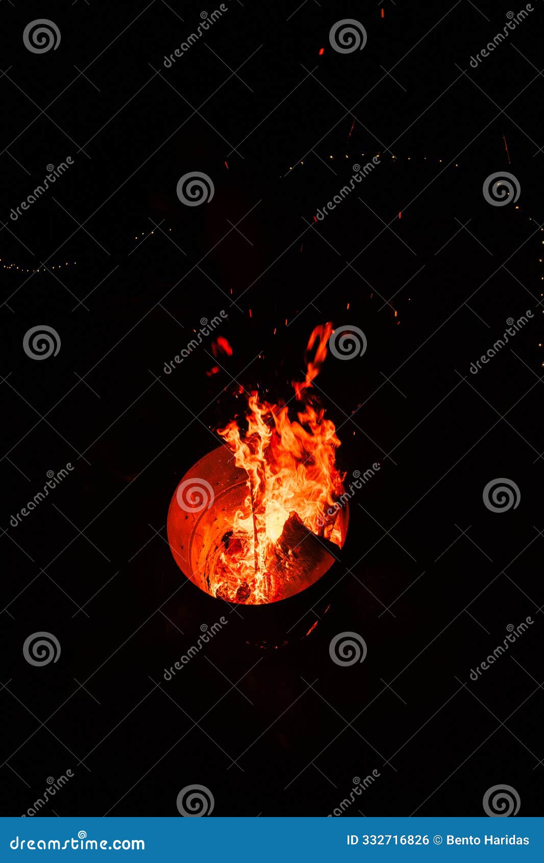 Burning Barrel with Jumping Sparks Flying Up in the Dark Stock Photo ...