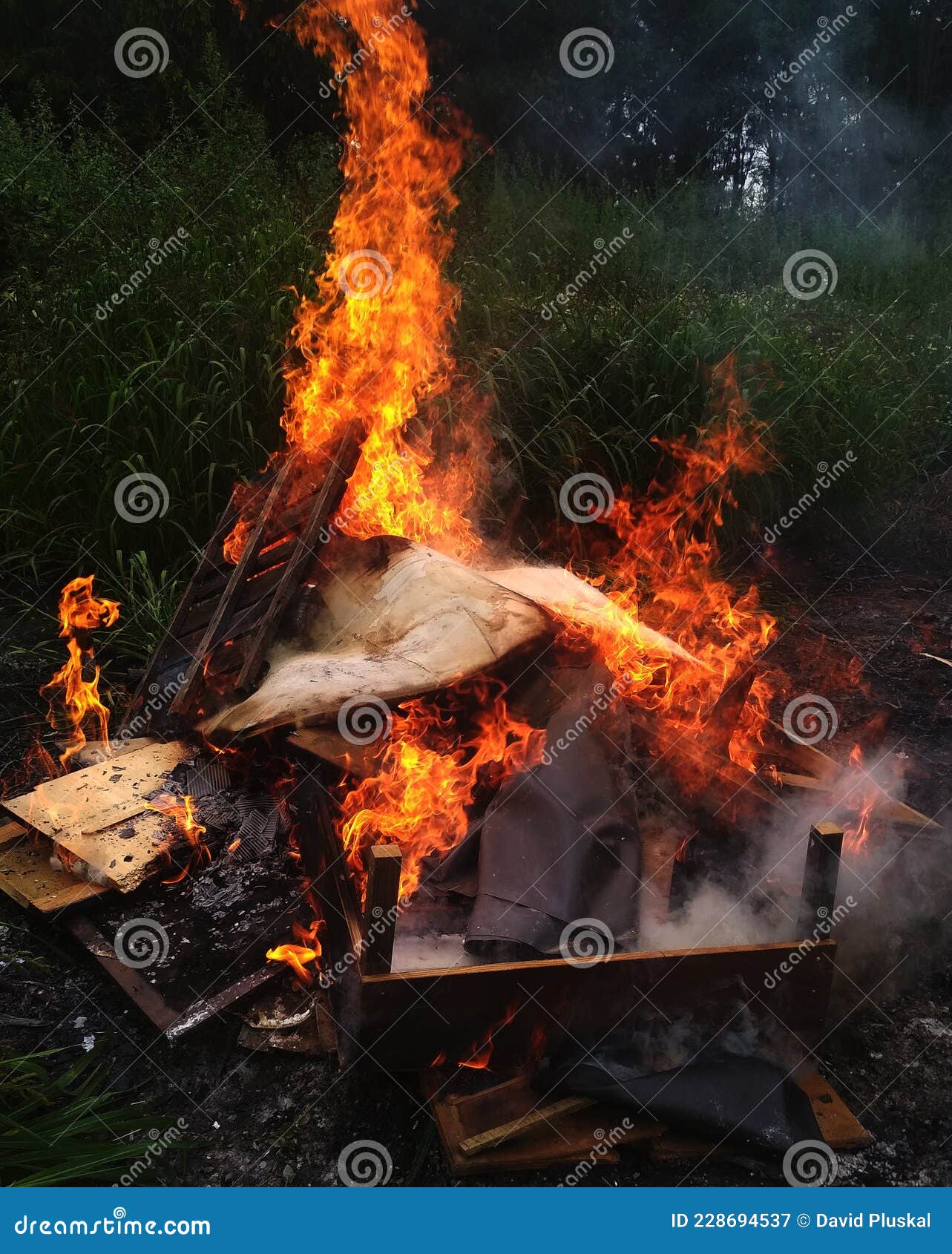 Burning beds and flame stock image. Image of beds, clothes - 228694537
