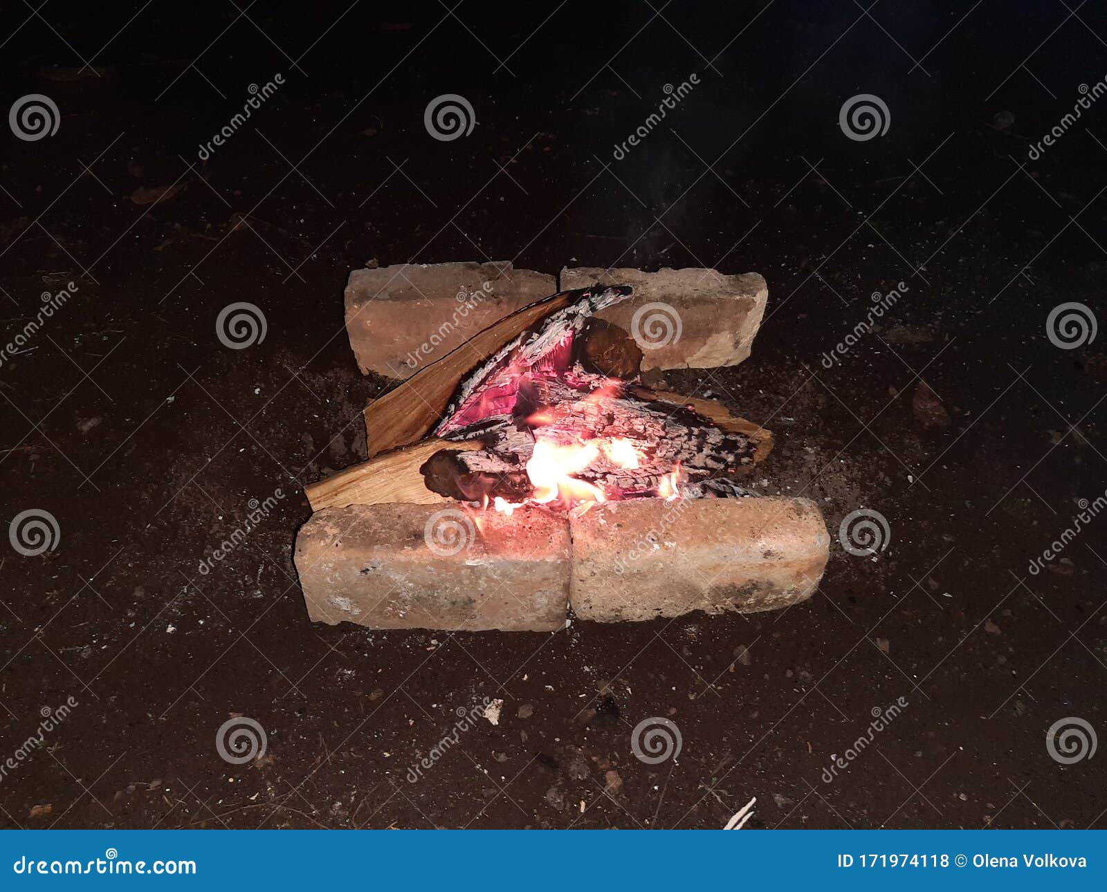 Burning Bonfire with Bricks Against the Backdrop of a Night Landscape ...