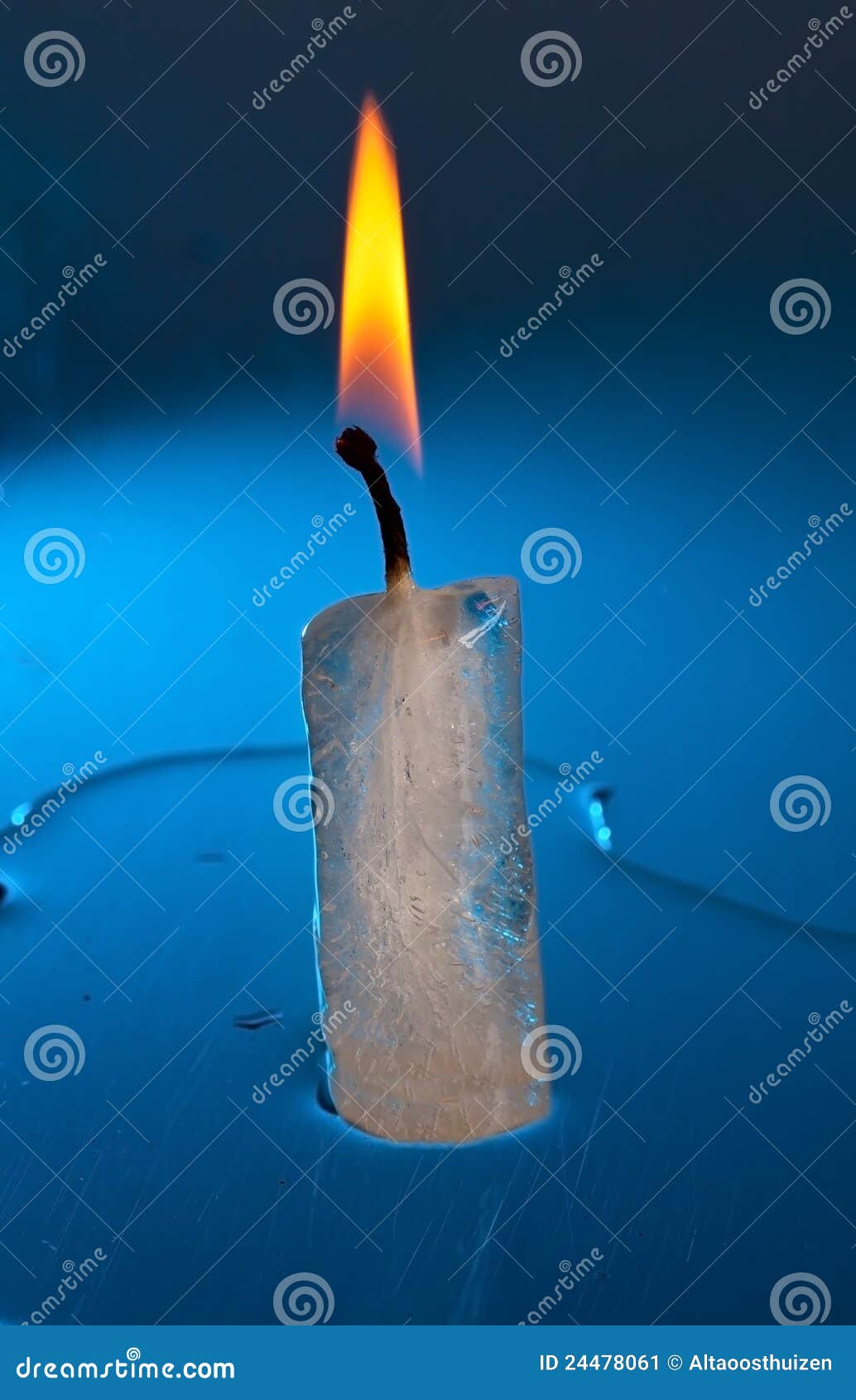 Burning candle made of ice stock image. Image of yellow - 24478061
