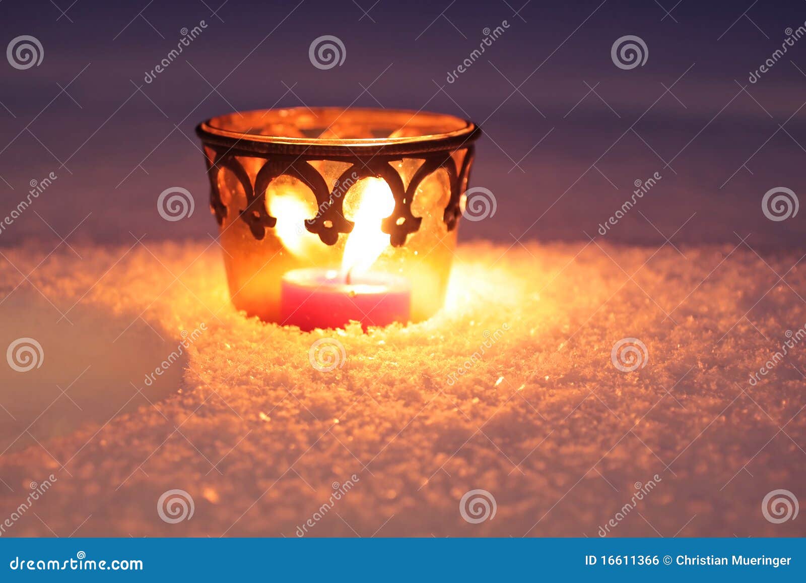 Burning candle in the snow stock photo. Image of decorative - 16611366