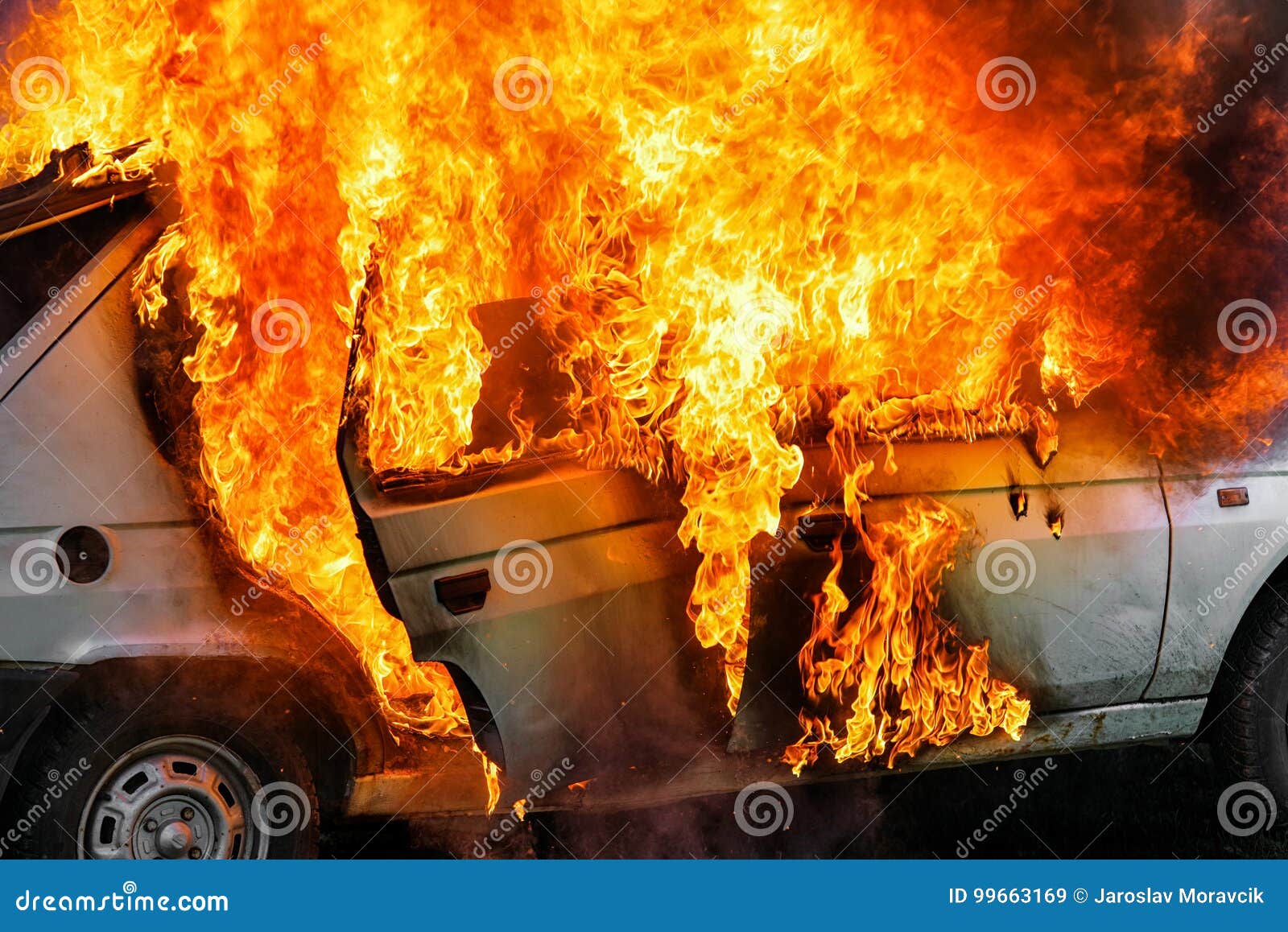 Burning car after accident stock image. Image of heat - 99663169