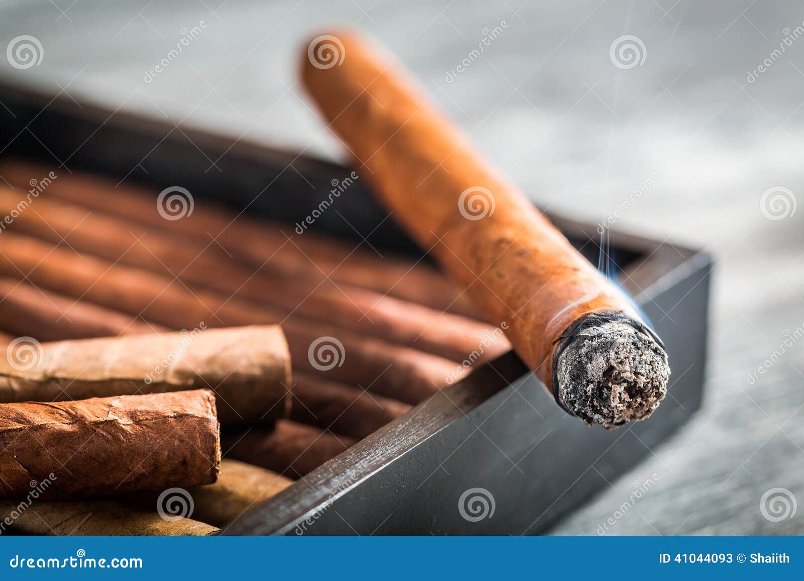 Burning cigar with smoke stock image. Image of activity - 41044093