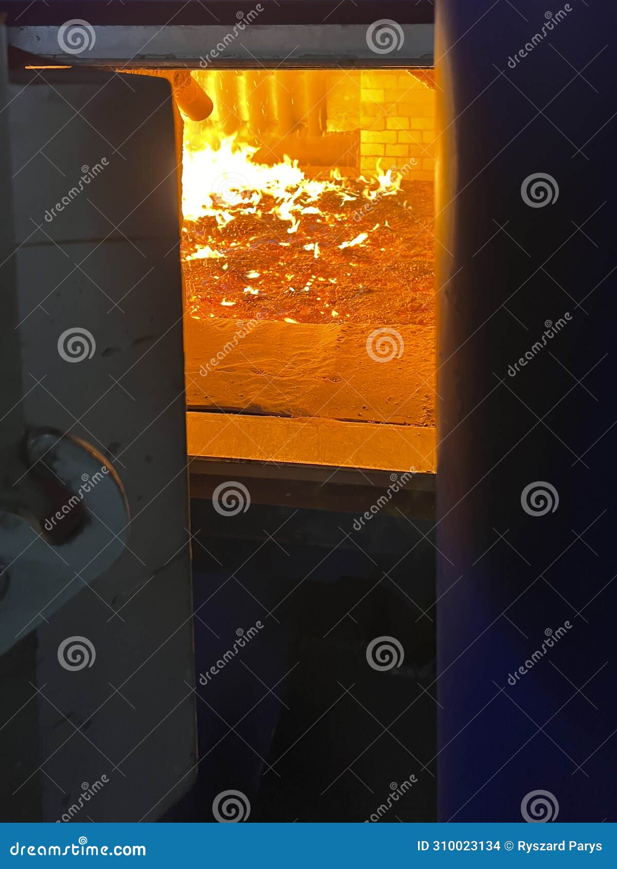 Burning Coal and on a Mechanical Grate Visible through the Open Hatch ...
