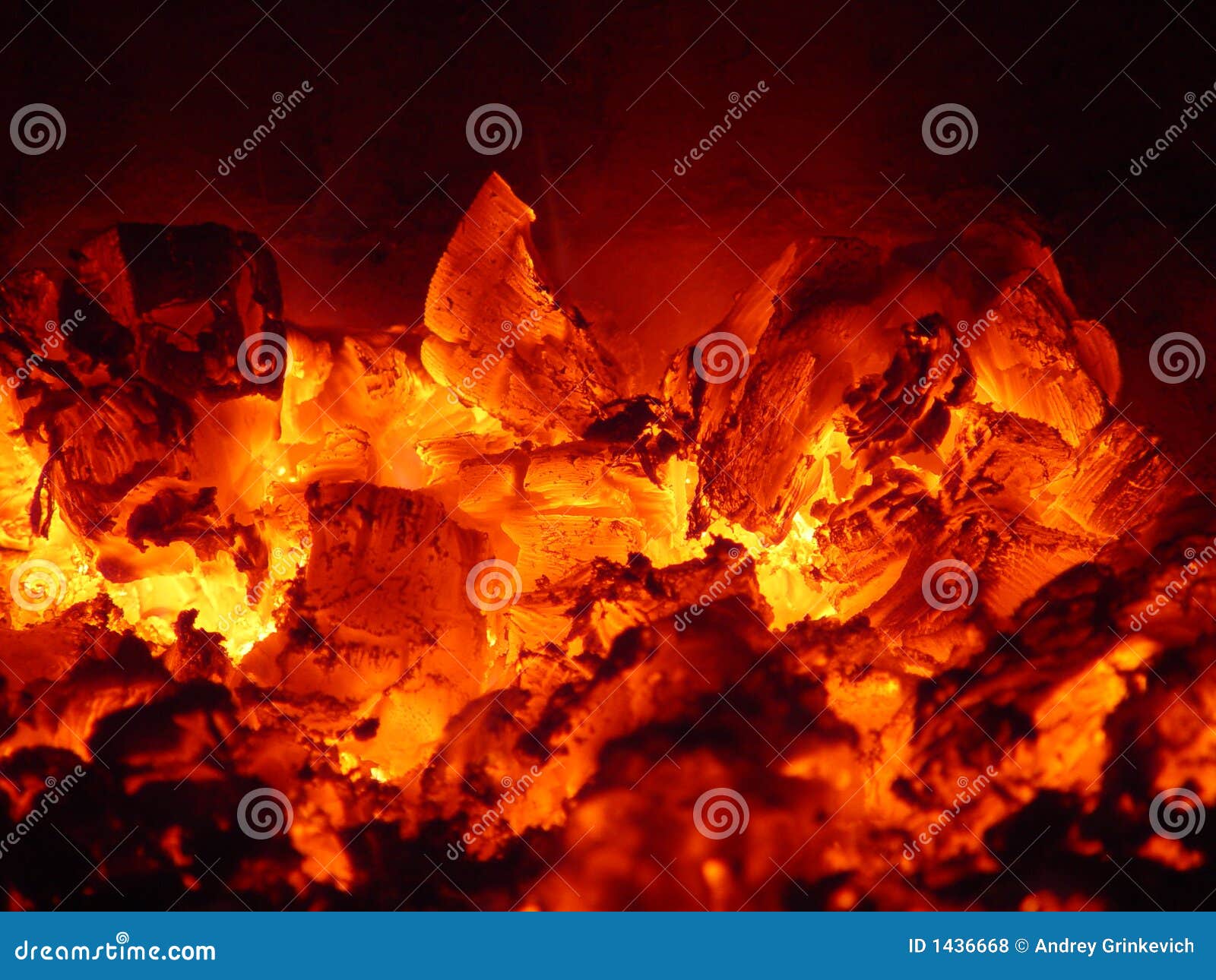 Burning Coals And Fire Through A Crack In The Cast Iron Lid Of The ...
