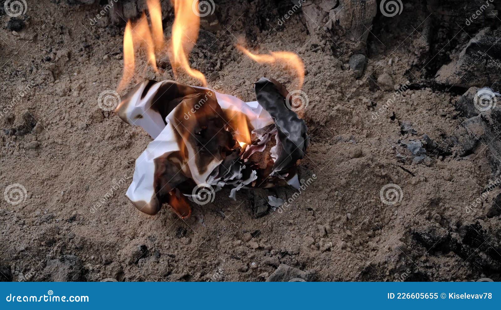 Burning Crumpled White Paper in Ash and Coals. Destruction of the ...