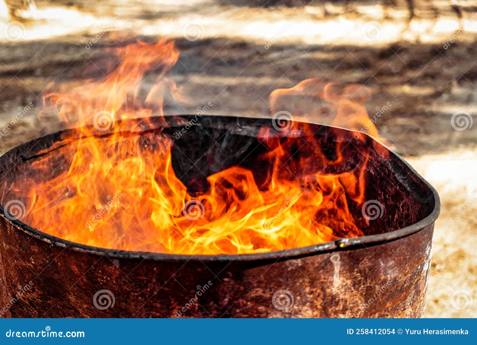 Burning Fire in a Barrel Close-up. Bright Flame. Open Flame Heating ...