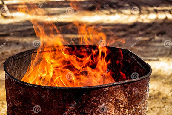 Burning Fire in a Barrel Close-up. Bright Flame. Open Flame Heating ...