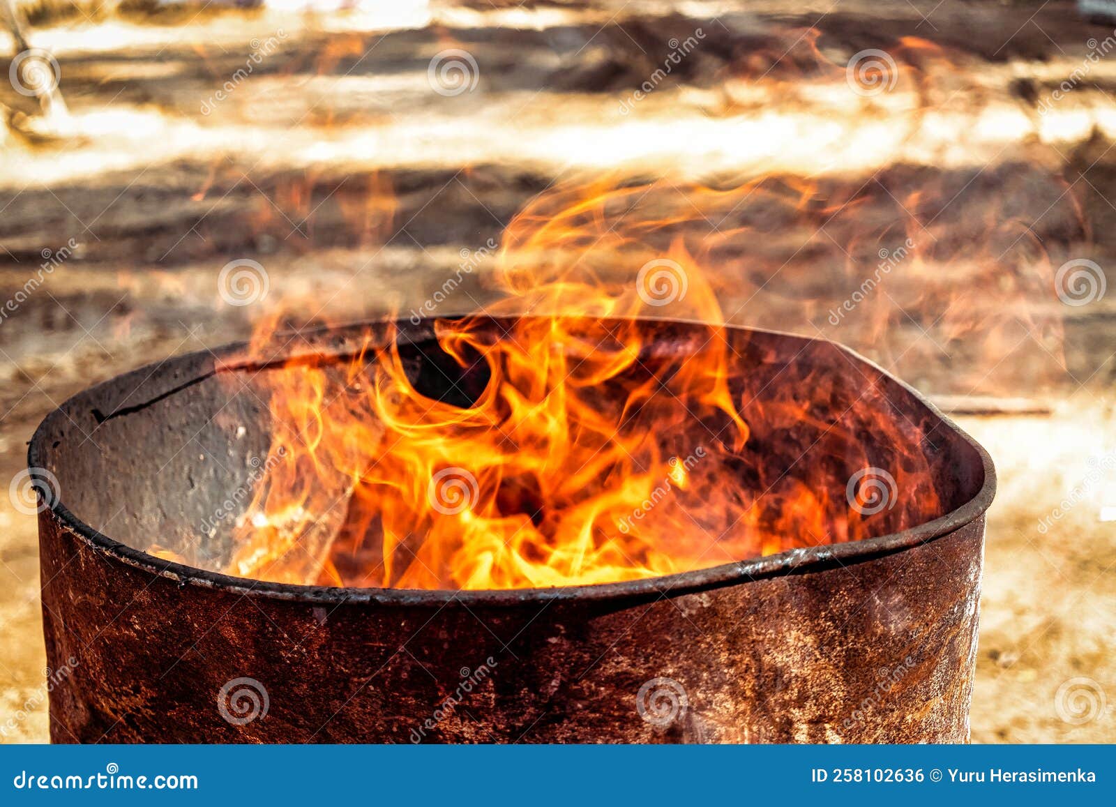 Burning Fire in a Barrel Close-up. Bright Flame. Open Flame Heating ...