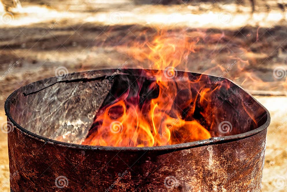Burning Fire in a Barrel Close-up. Bright Flame. Open Flame Heating ...