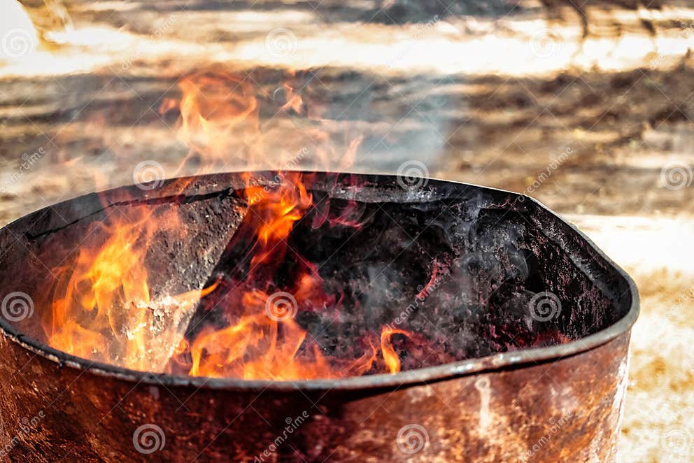 Burning Fire in a Barrel Close-up. Bright Flame. Open Flame Heating ...