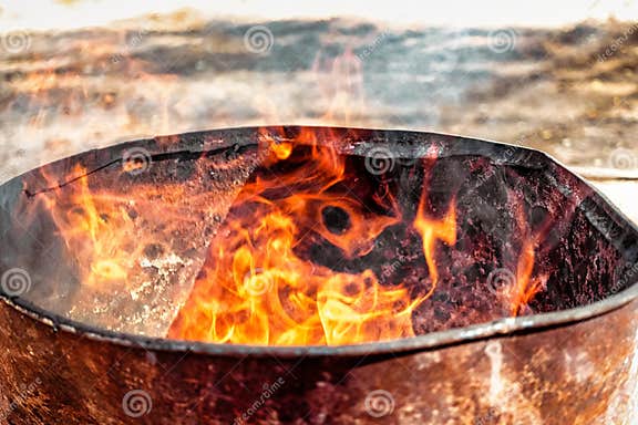 Burning Fire in a Barrel Close-up. Bright Flame. Open Flame Heating ...