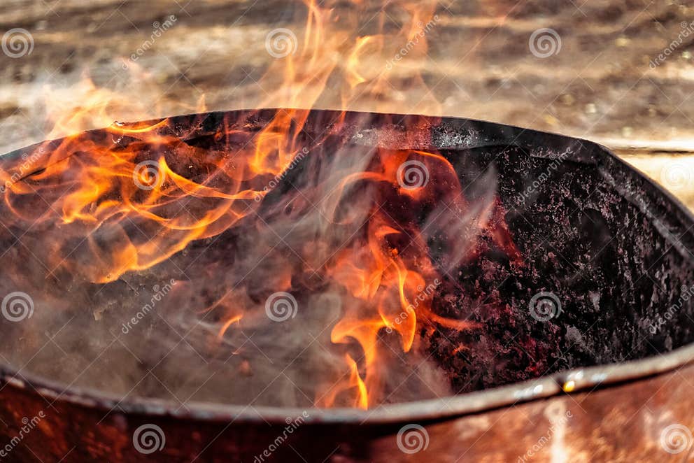Burning Fire in a Barrel Close-up. Bright Flame. Open Flame Heating ...