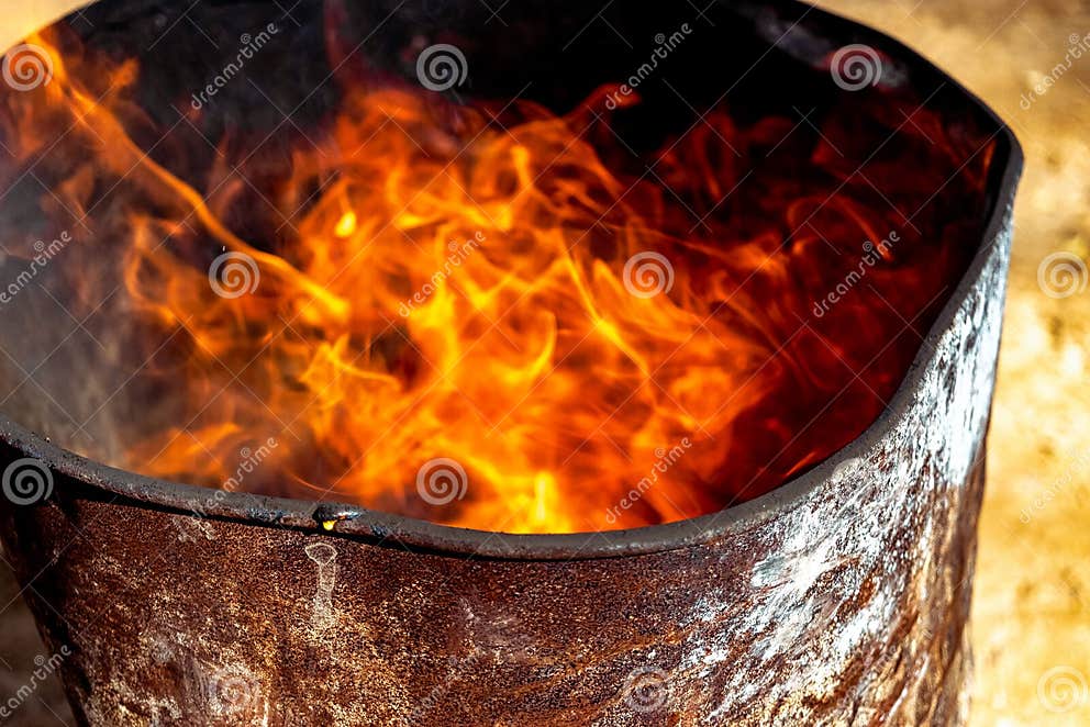 Burning Fire in a Barrel Close-up. Bright Flame. Open Flame Heating ...