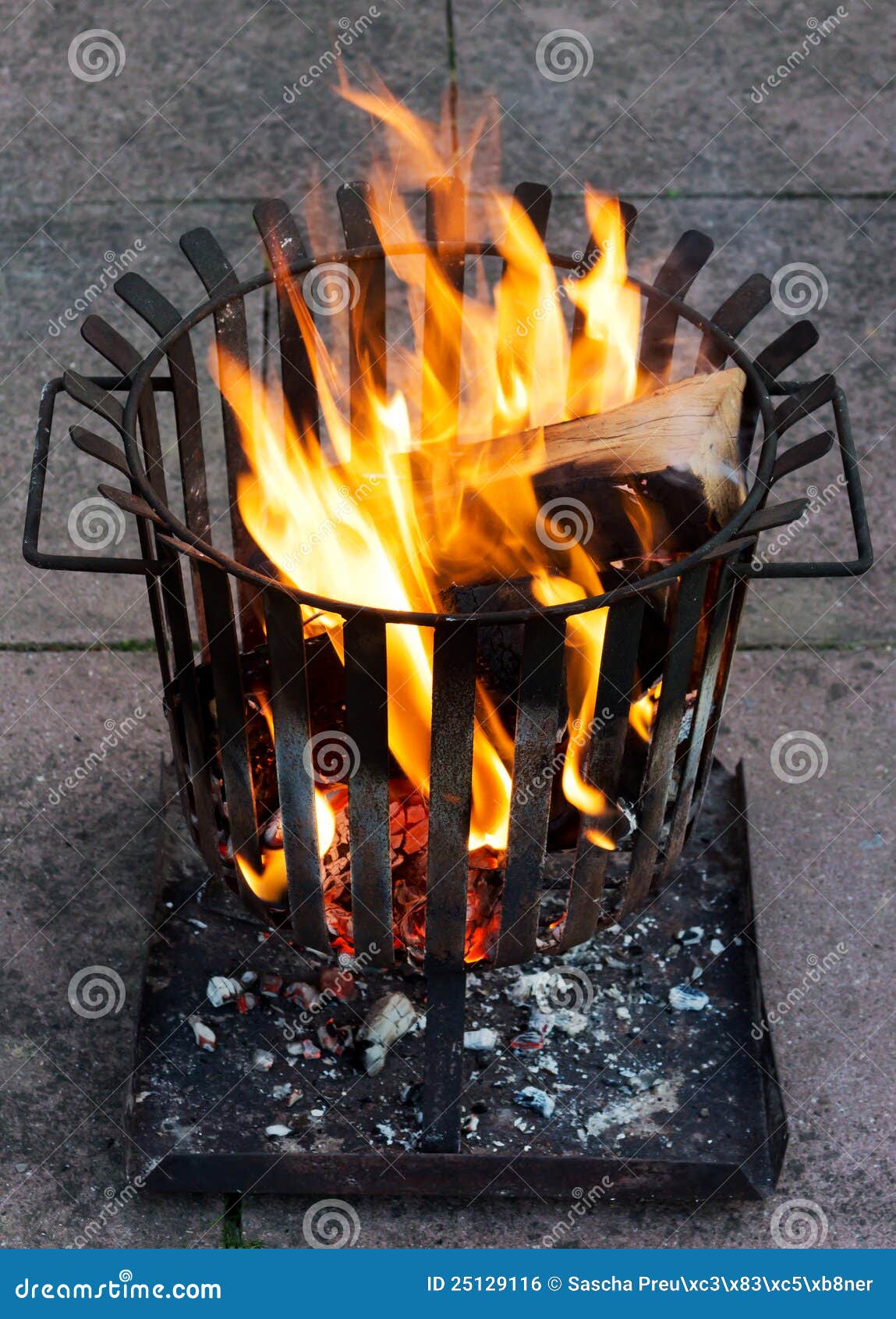 Burning fire basket stock photo. Image of garden, bright - 25129116