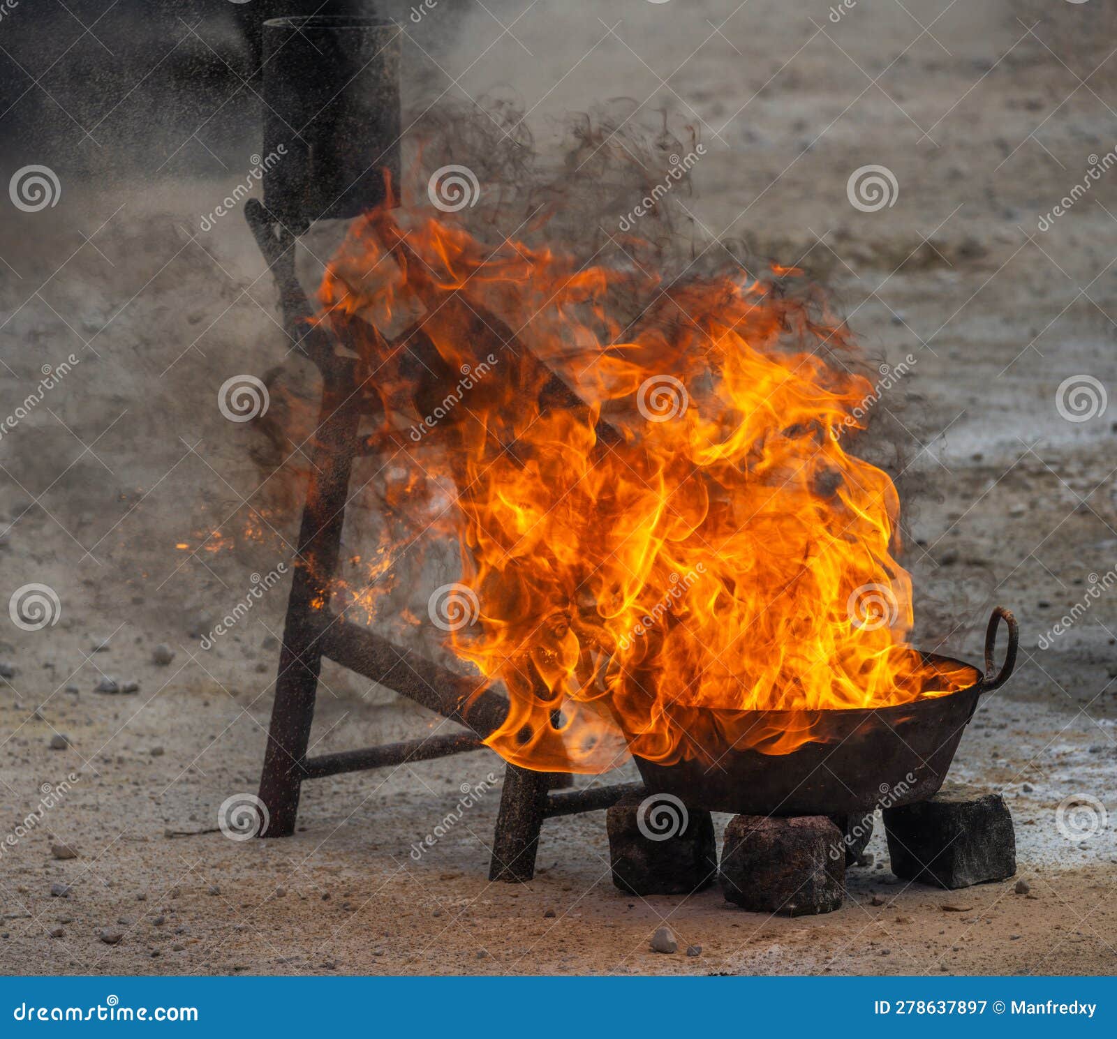Burning fire in a fire pit stock image. Image of flame - 278637897