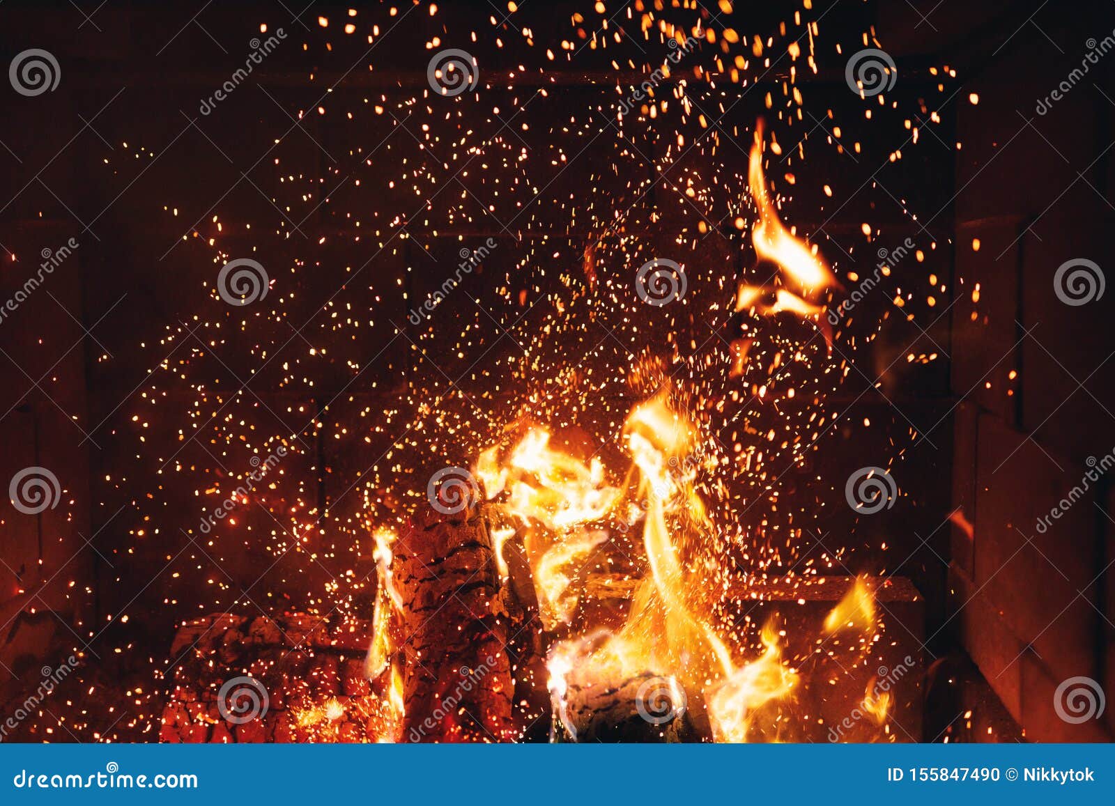 Burning Fire Logs with Sparks in the Fireplace Stock Photo - Image of ...