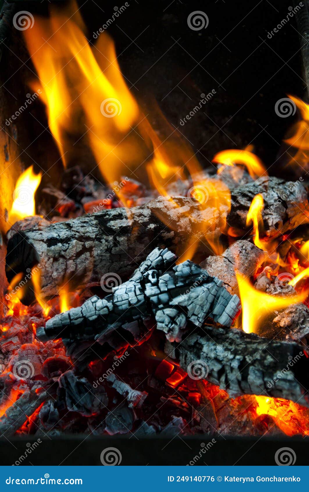 Burning Fire Wood and Smoldering Embers Close View Abstract Background ...