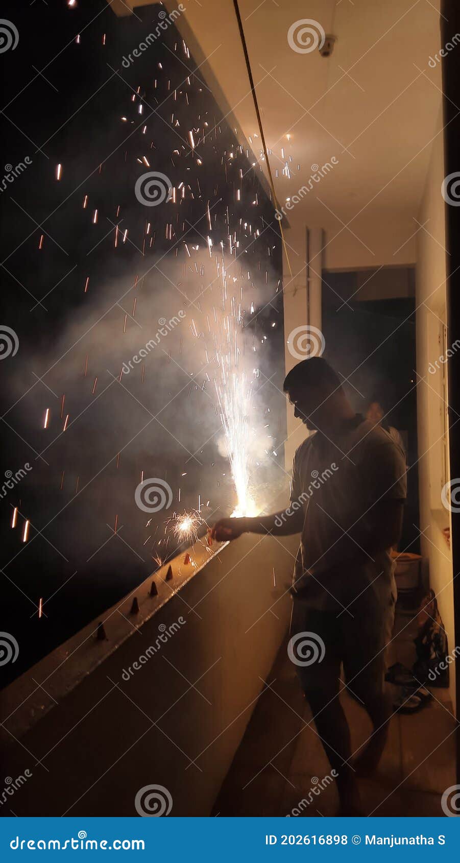 Burning Firecrackers in a Dark Outside of the House Editorial Stock ...