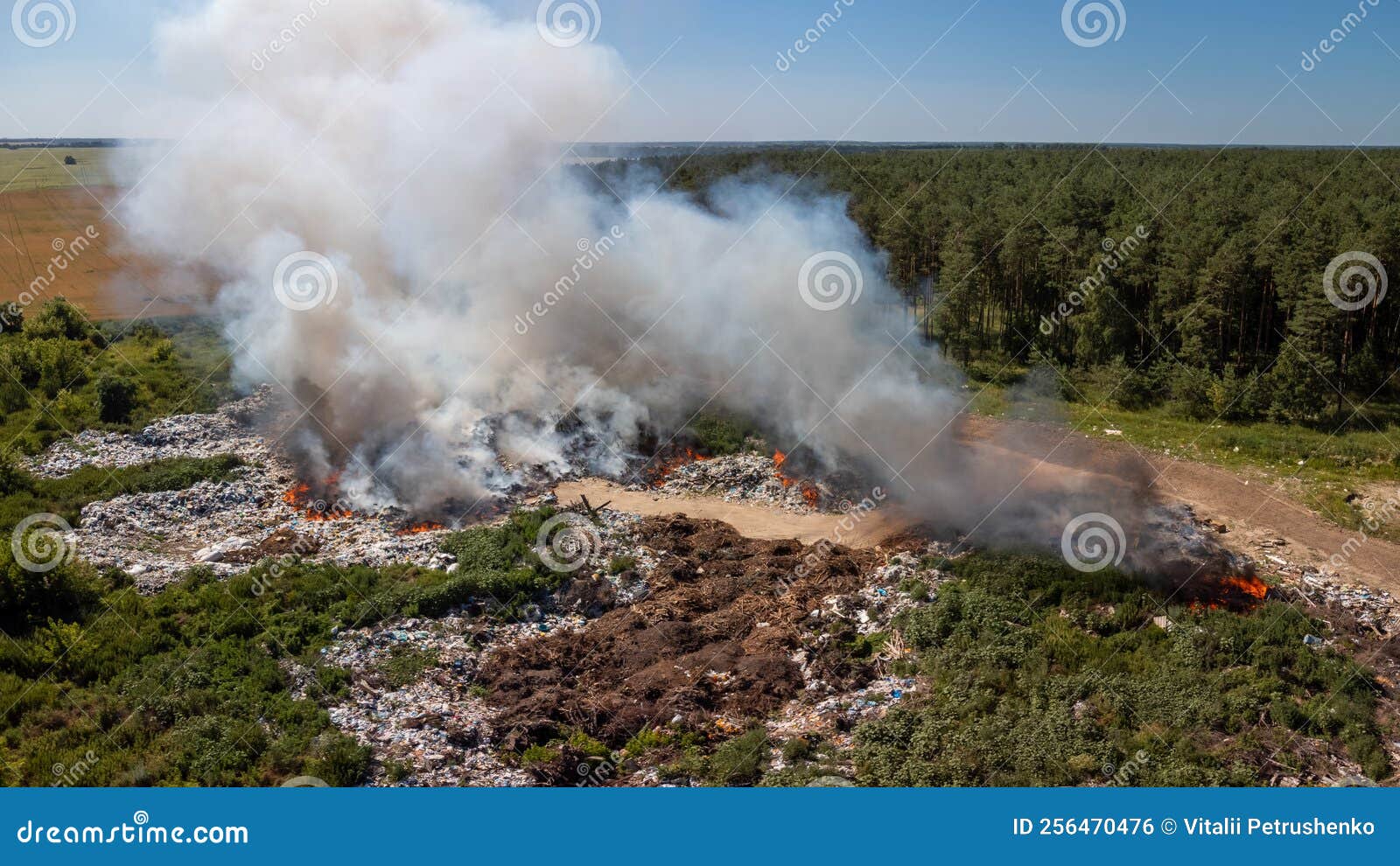 Photo of Garbage Dump in Fire Stock Photo - Image of danger, illegal ...