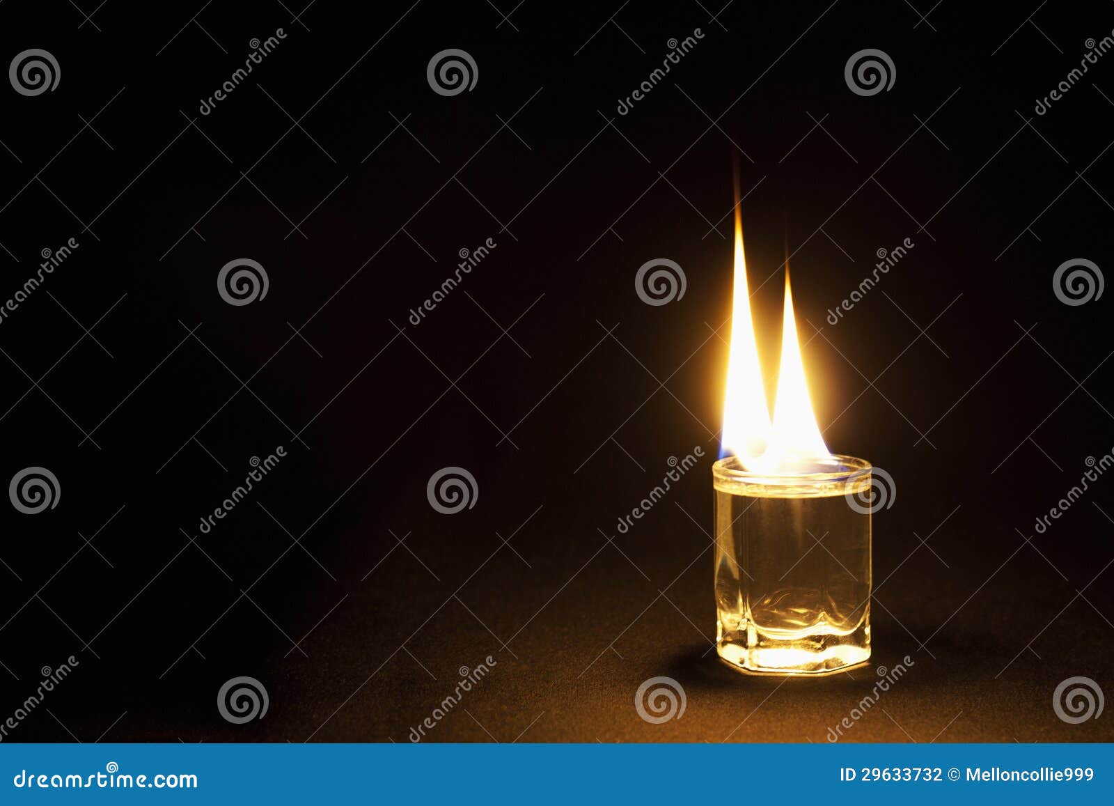 Burning glass with alcohol stock photo. Image of drink - 29633732