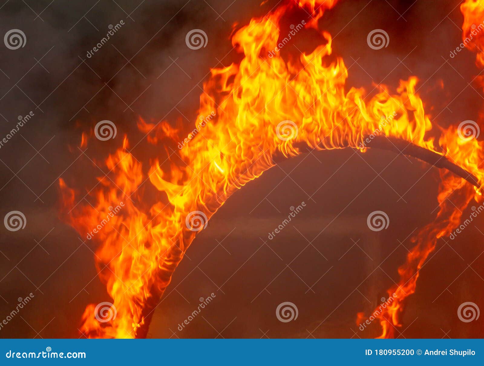 Burning hoop in nature stock photo. Image of inferno - 180955200